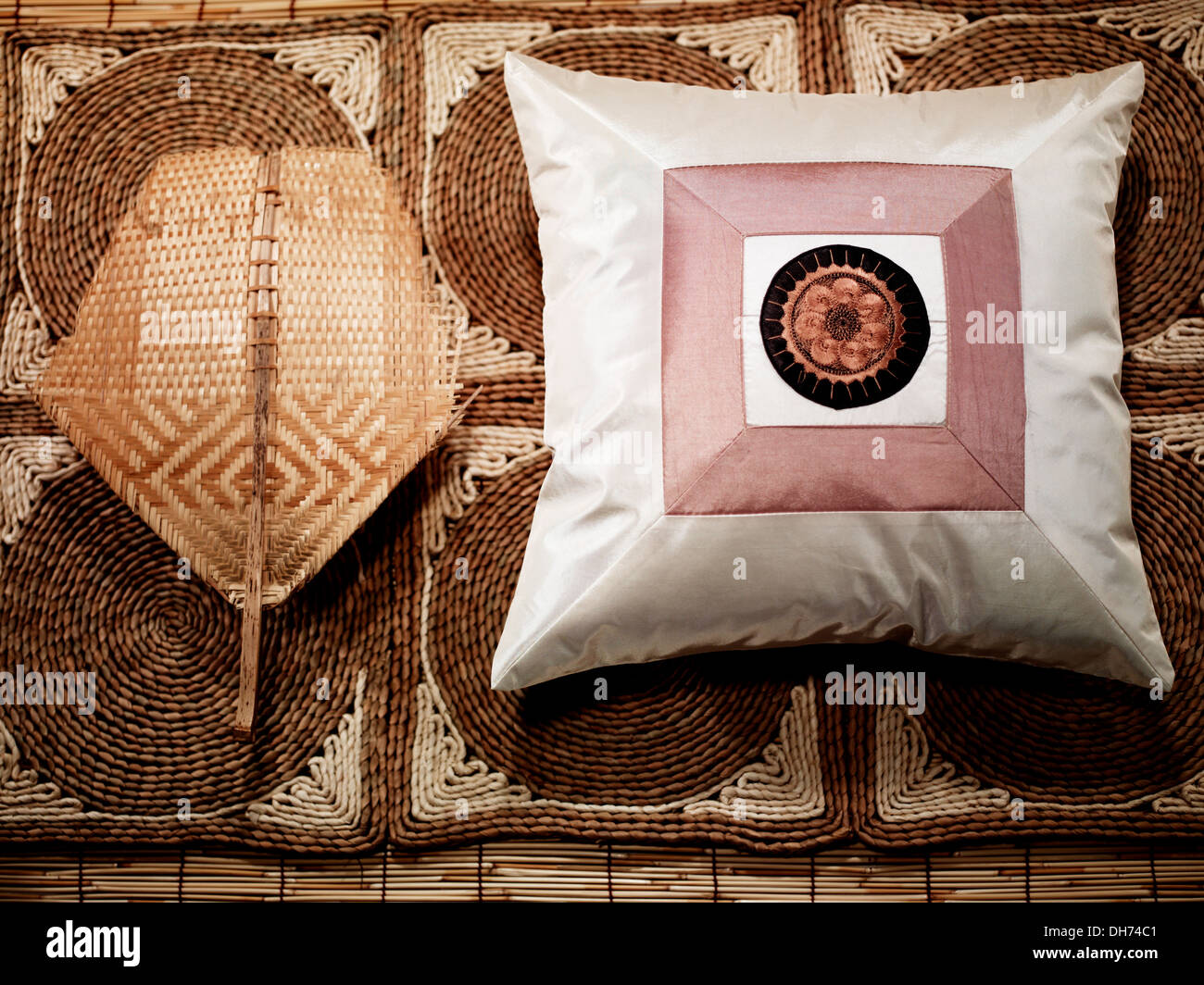 Chinese traditional fan in bamboo and cushion with Chinese traditional ...