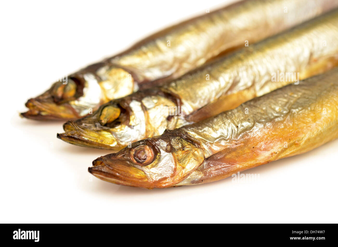smoked fish isolated on white background Stock Photo - Alamy