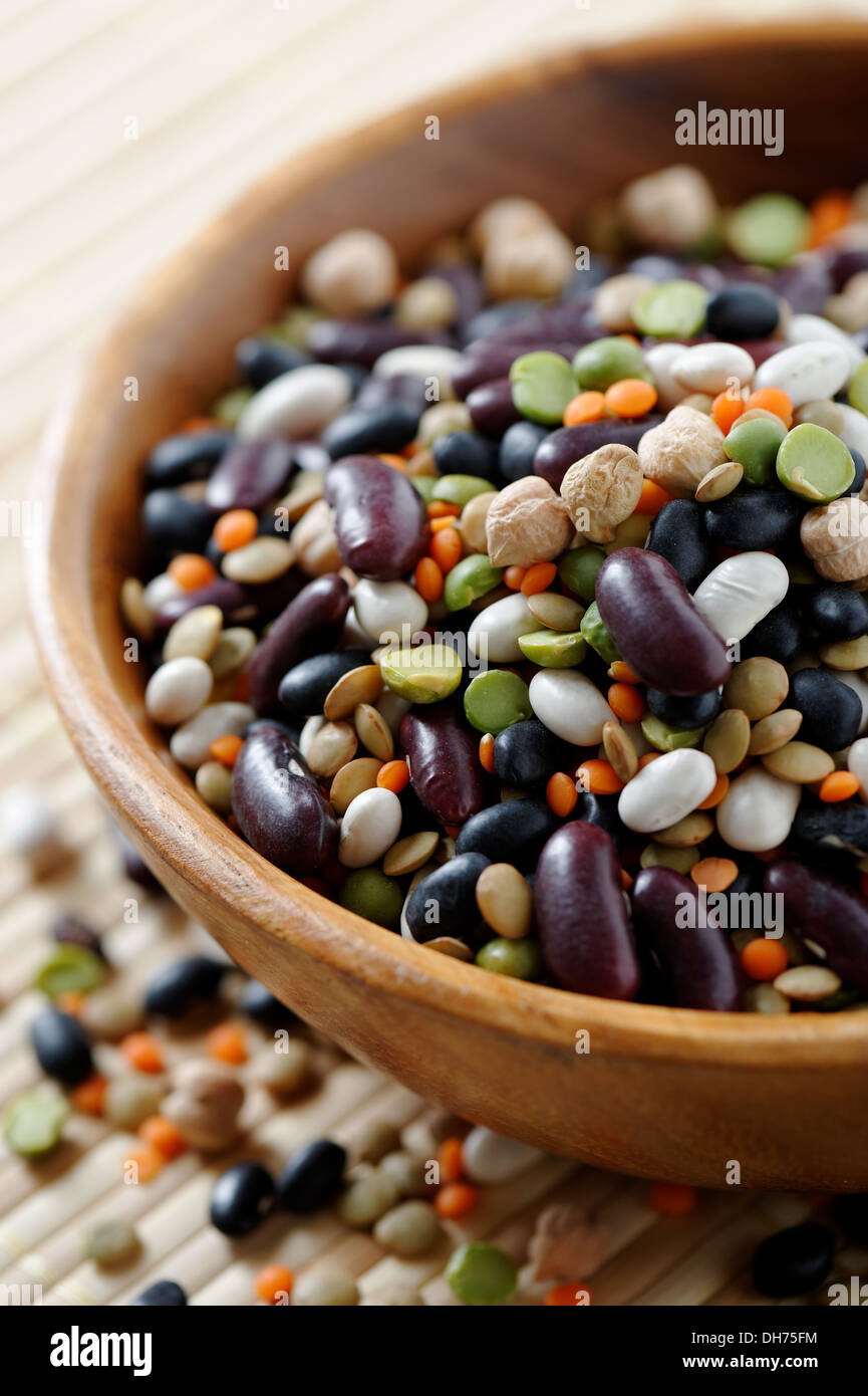 Wooden bowl full of mixed beans Stock Photo - Alamy