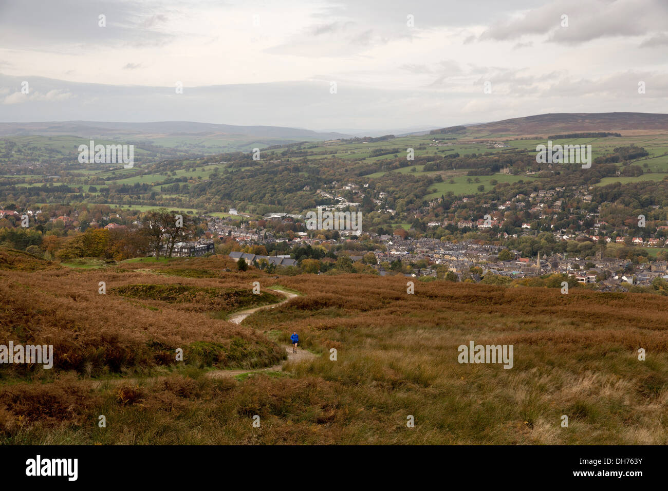 The view of Ilkley town taken from the top of Ilkley Moor as a runner ...