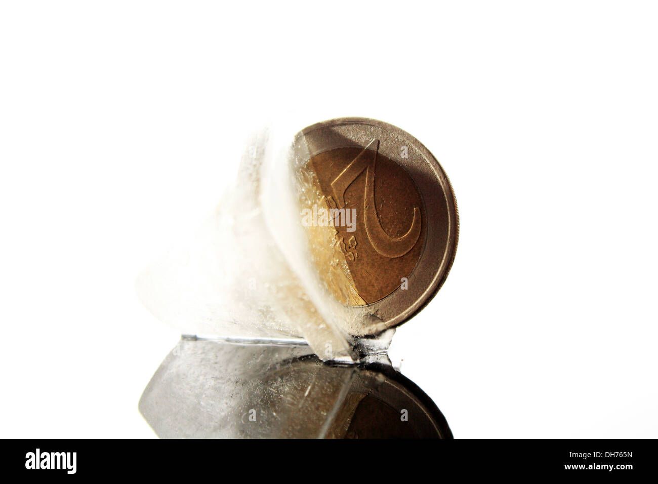 Ice Cube with Euro Coin Stock Photo - Alamy
