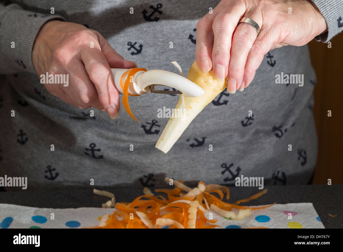 Peeling a parsnip ready for cooking Stock Photo - Alamy