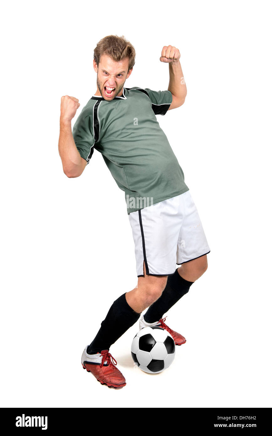 Happy football player with a ball isolated in white Stock Photo - Alamy
