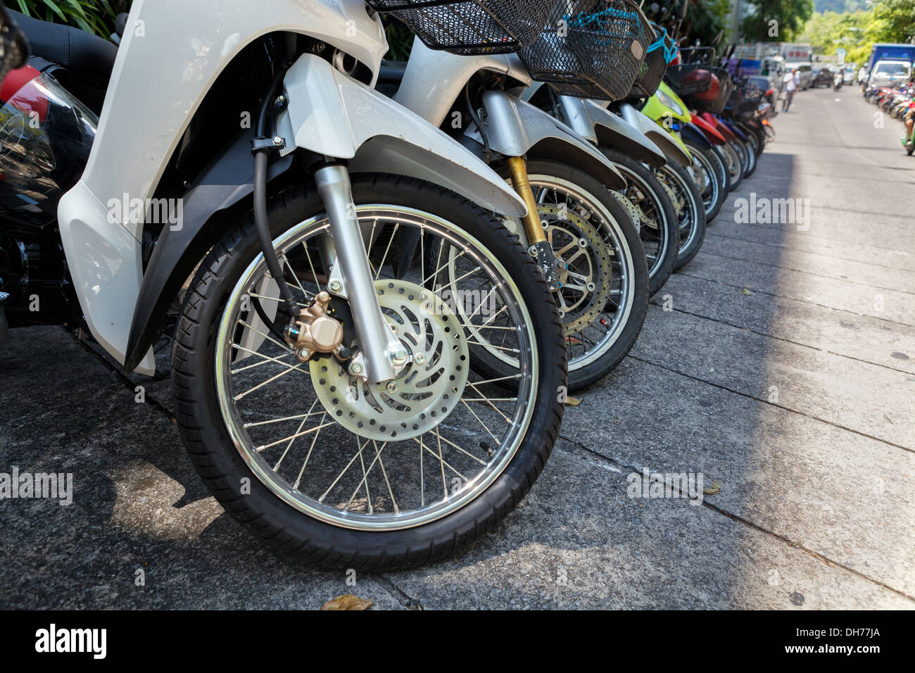 Many motorbikes at the parking near big store Stock Photo - Alamy