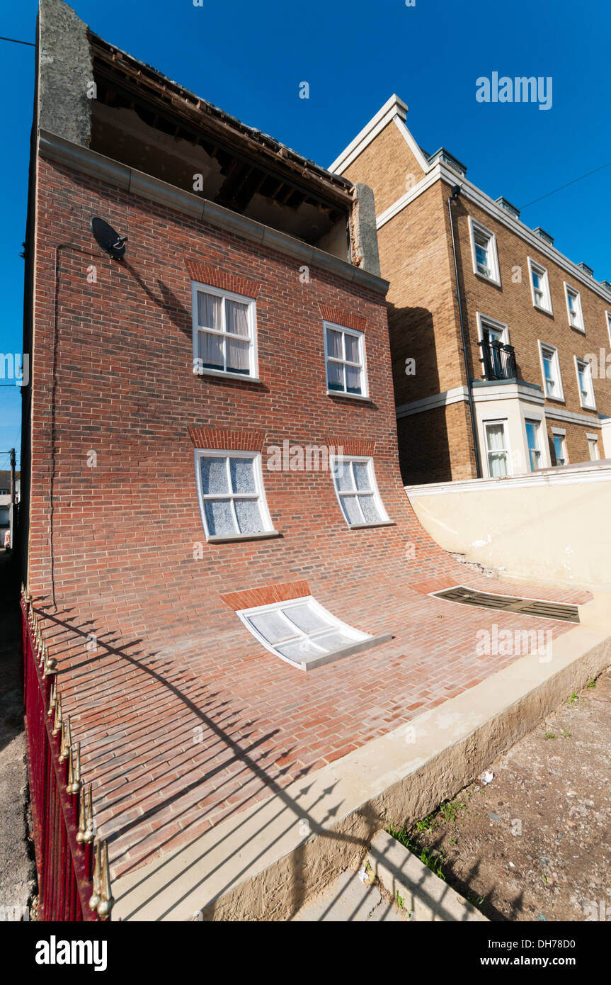 'From the knees of my nose to the belly of my toes', the house sliding ...