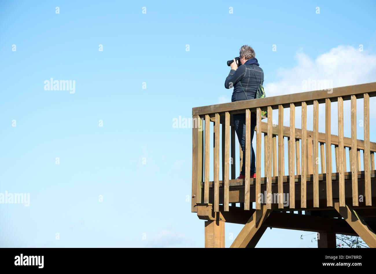 adult woman making photos from observation post Stock Photo - Alamy