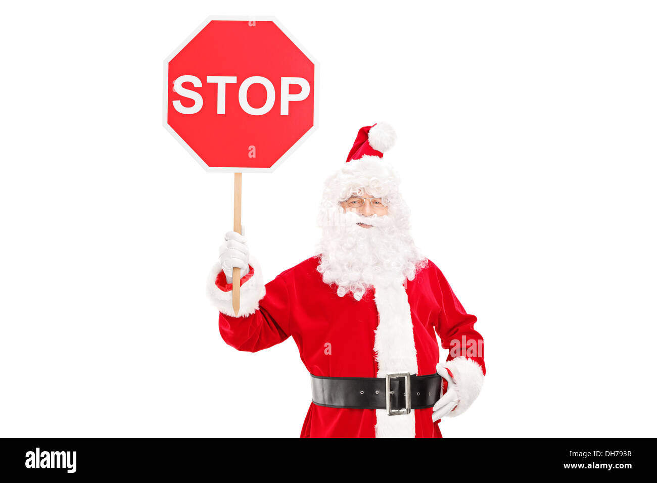 Smiling Santa Claus holding a stop sign Stock Photo - Alamy