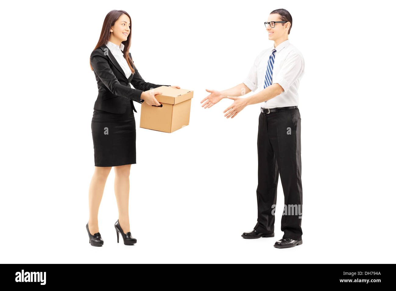 Full length portrait of a young businesswoman giving a box to her ...