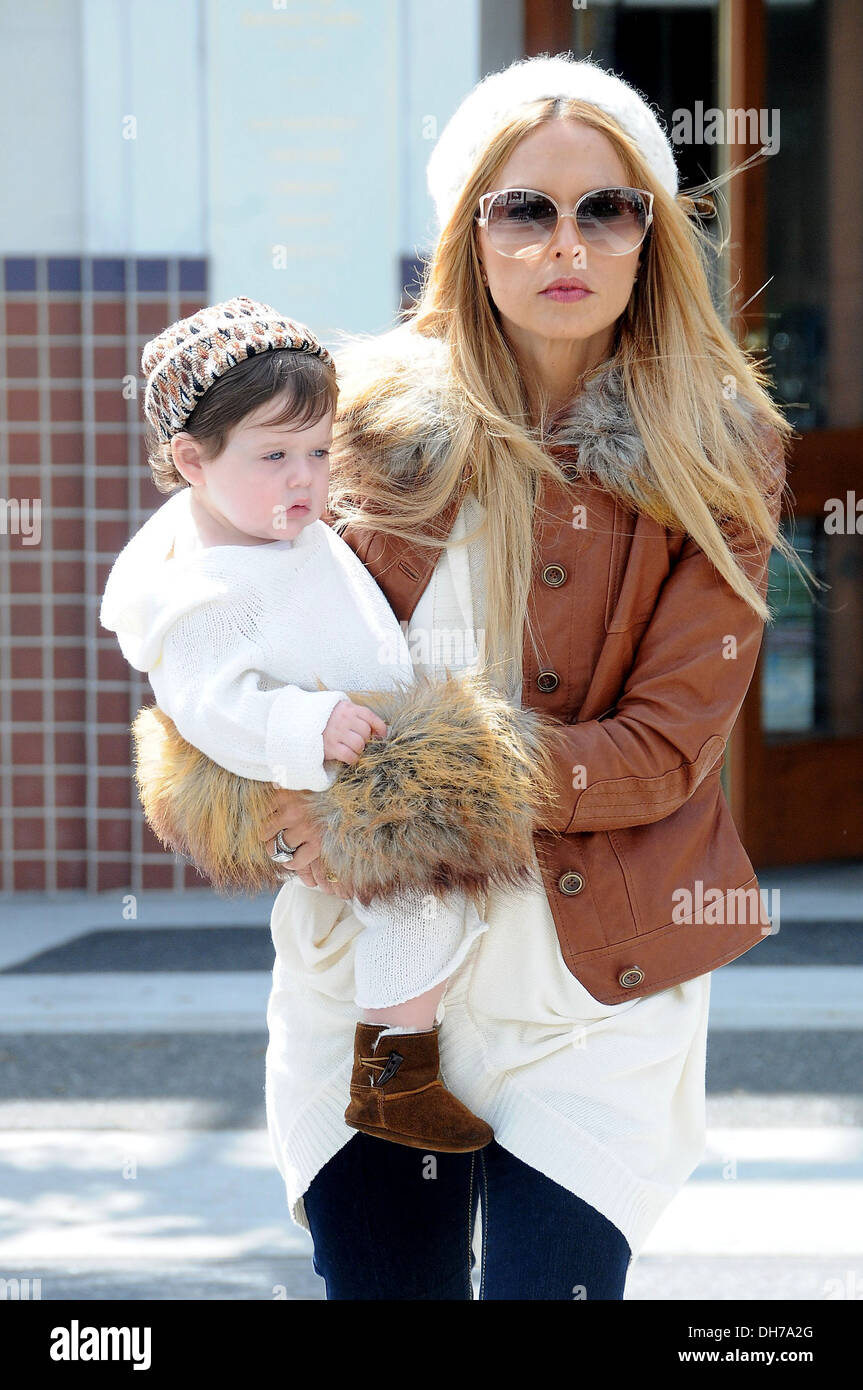 Rachel Zoe carries her son Skyler in her arms while out and about in ...