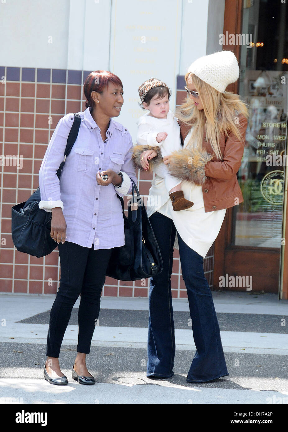 Rachel Zoe carries her son Skyler in her arms while out and about in ...
