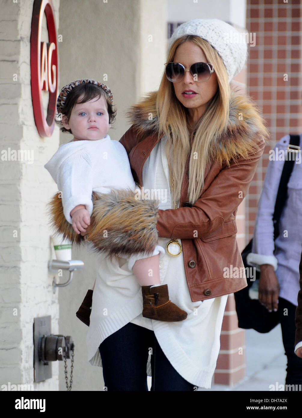 Rachel Zoe carries her son Skyler in her arms while out and about in ...