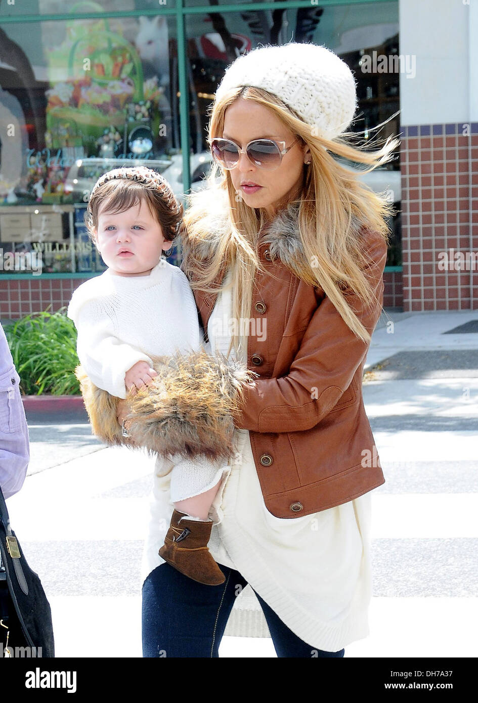 Rachel Zoe carries her son Skyler in her arms while out and about in ...