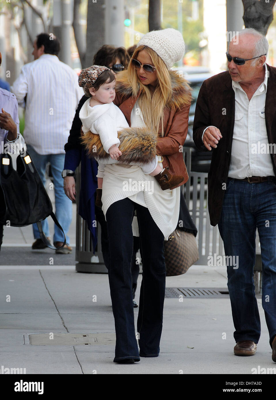 Rachel Zoe carries her son Skyler in her arms while out and about in ...