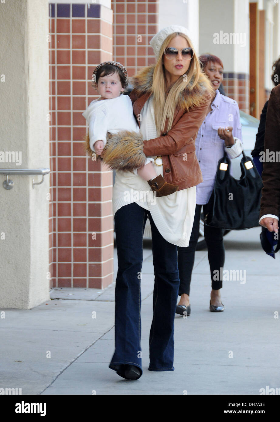 Rachel Zoe carries her son Skyler in her arms while out and about in ...