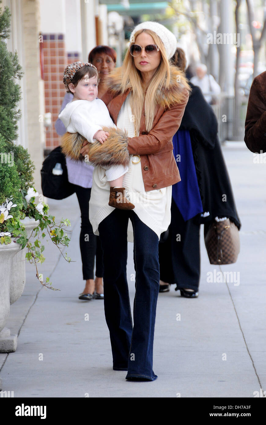 Rachel Zoe carries her son Skyler in her arms while out and about in ...