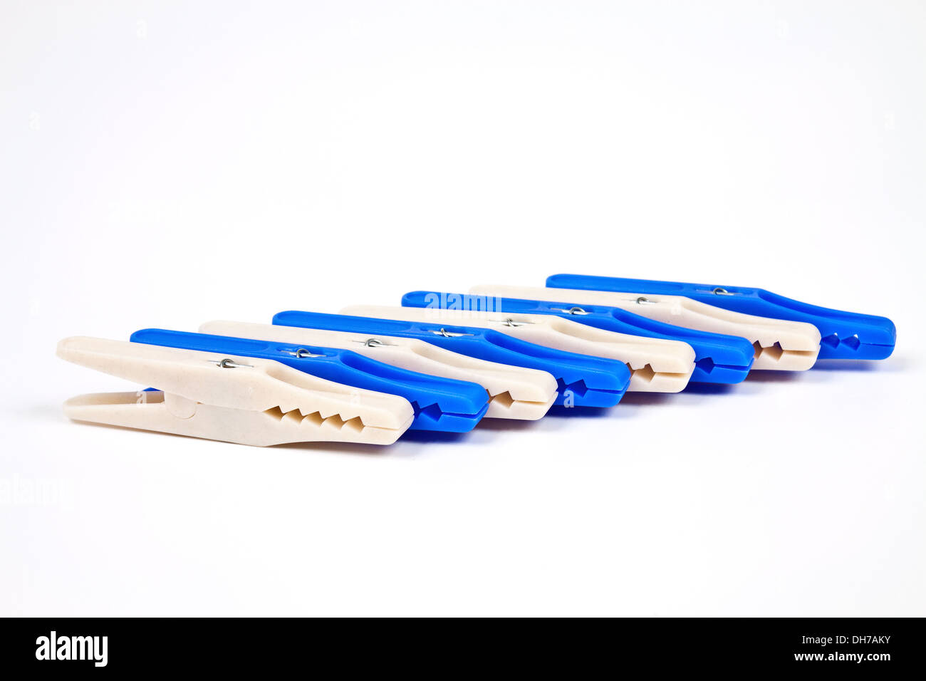 Colored plastic clothes pegs isolated on white background Stock Photo ...
