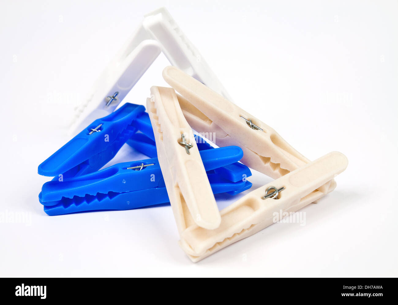 Colored plastic clothes pegs isolated on white background Stock Photo ...