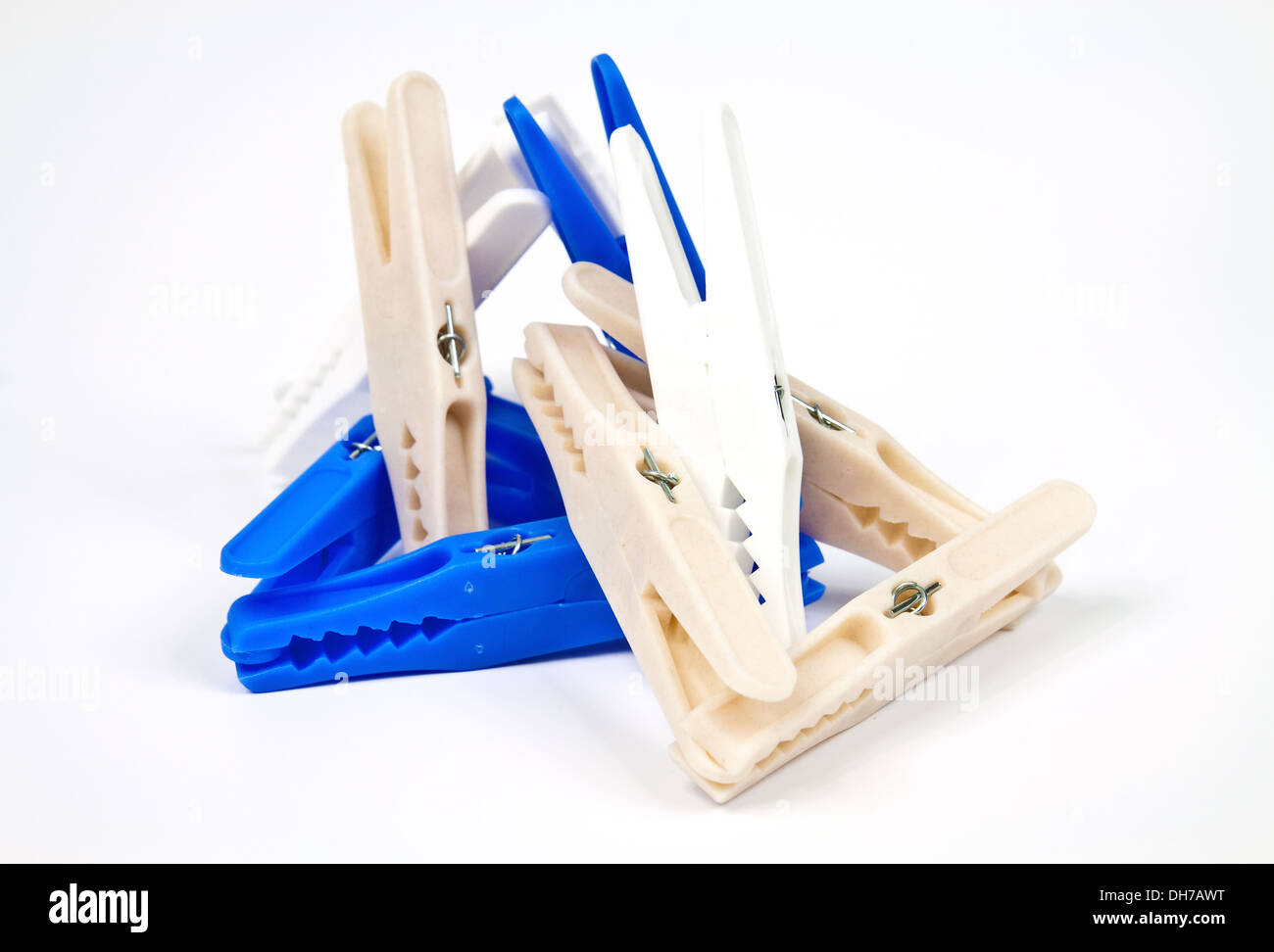Colored plastic clothes pegs isolated on white background Stock Photo ...