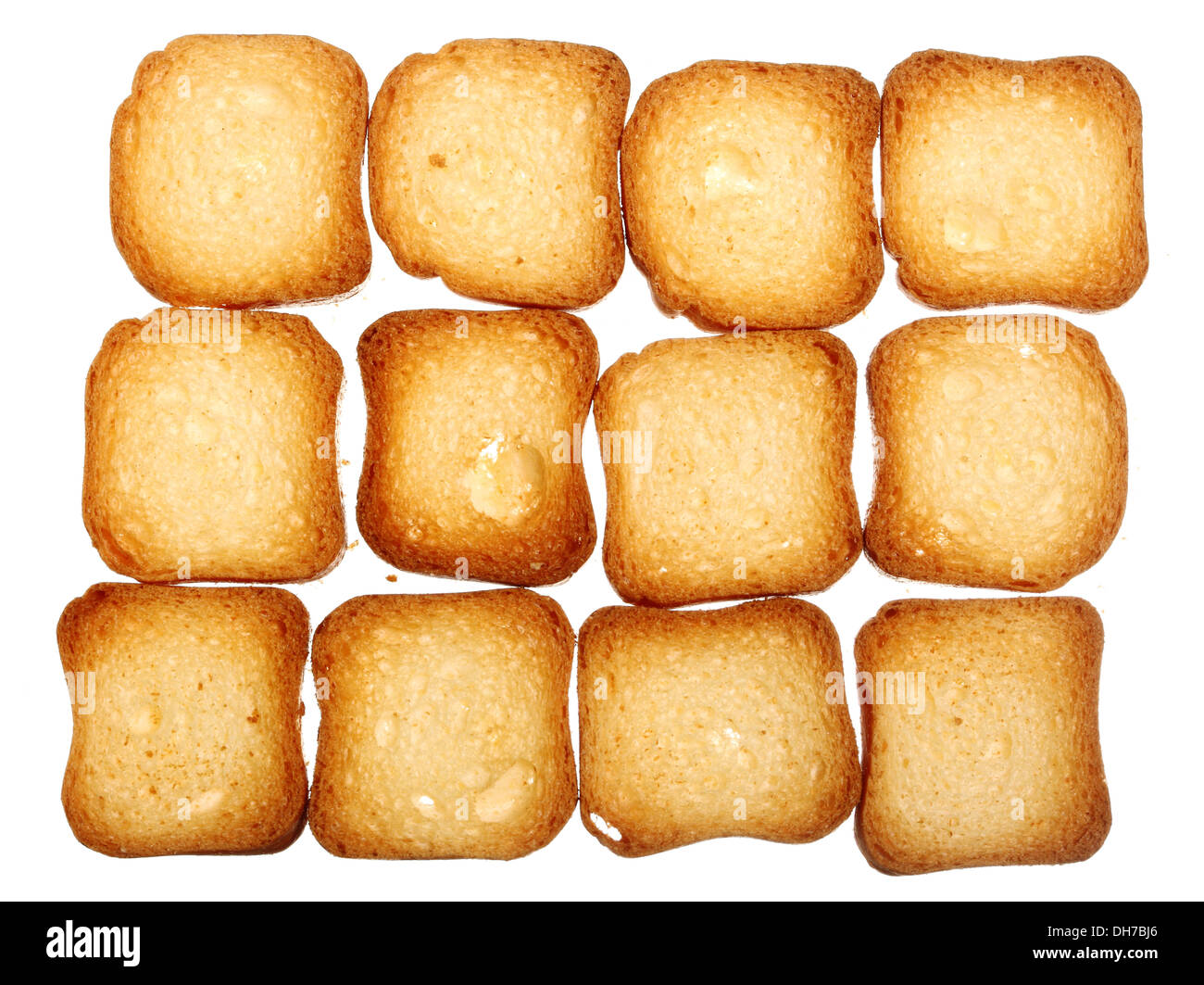 Many small dried rusks bread loaf toast biscuits as texture background ...