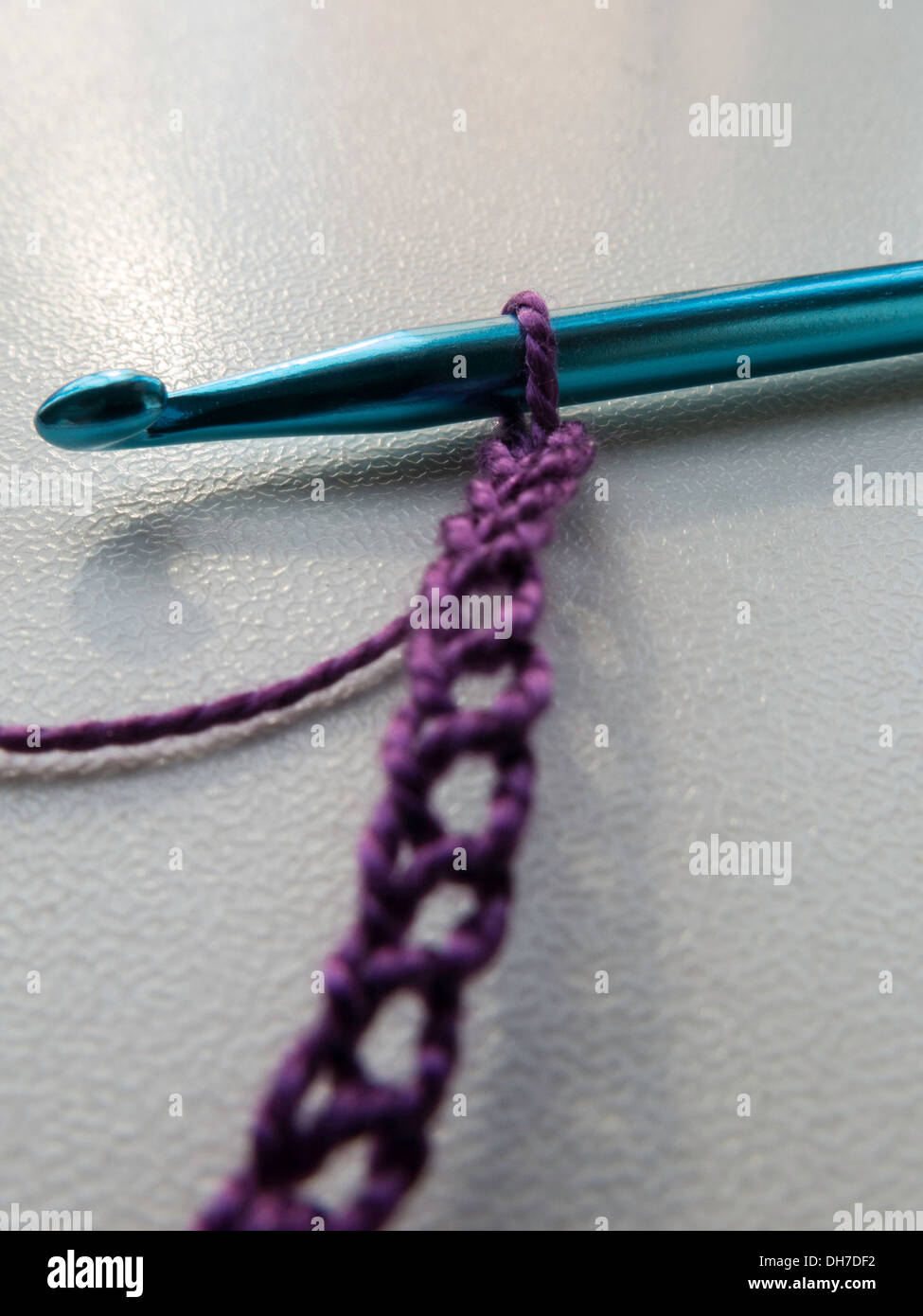 Still Life of Crochet Hook with Yarn Stock Photo - Alamy