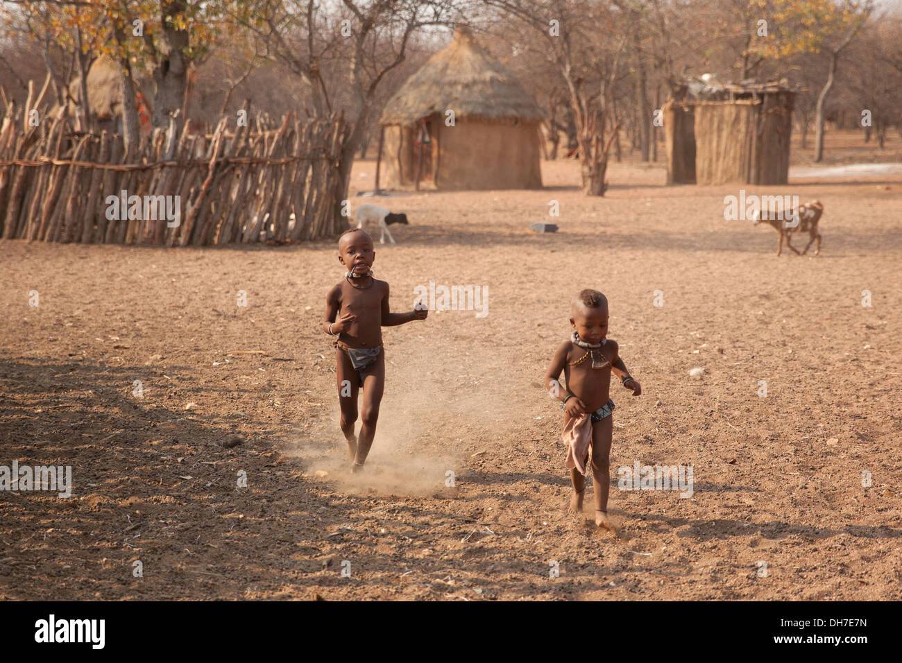 Himba children playing, in their village in Kamanjab, Namibia, Africa ...
