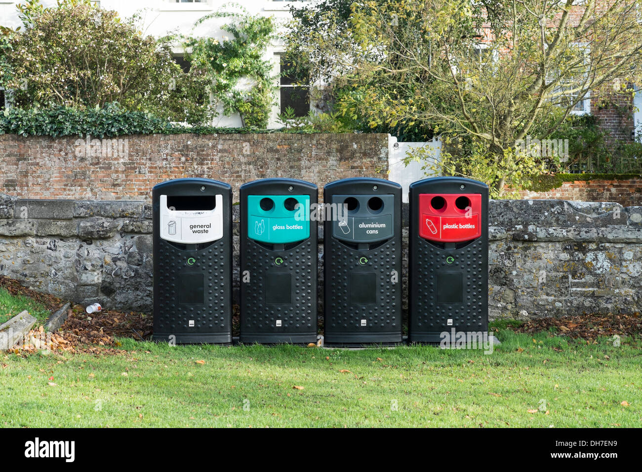 Row of plastic recycling bins Stock Photo - Alamy