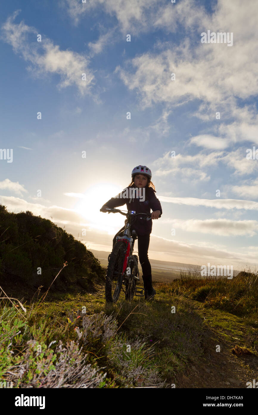Farm girl on bike hi-res stock photography and images - Alamy