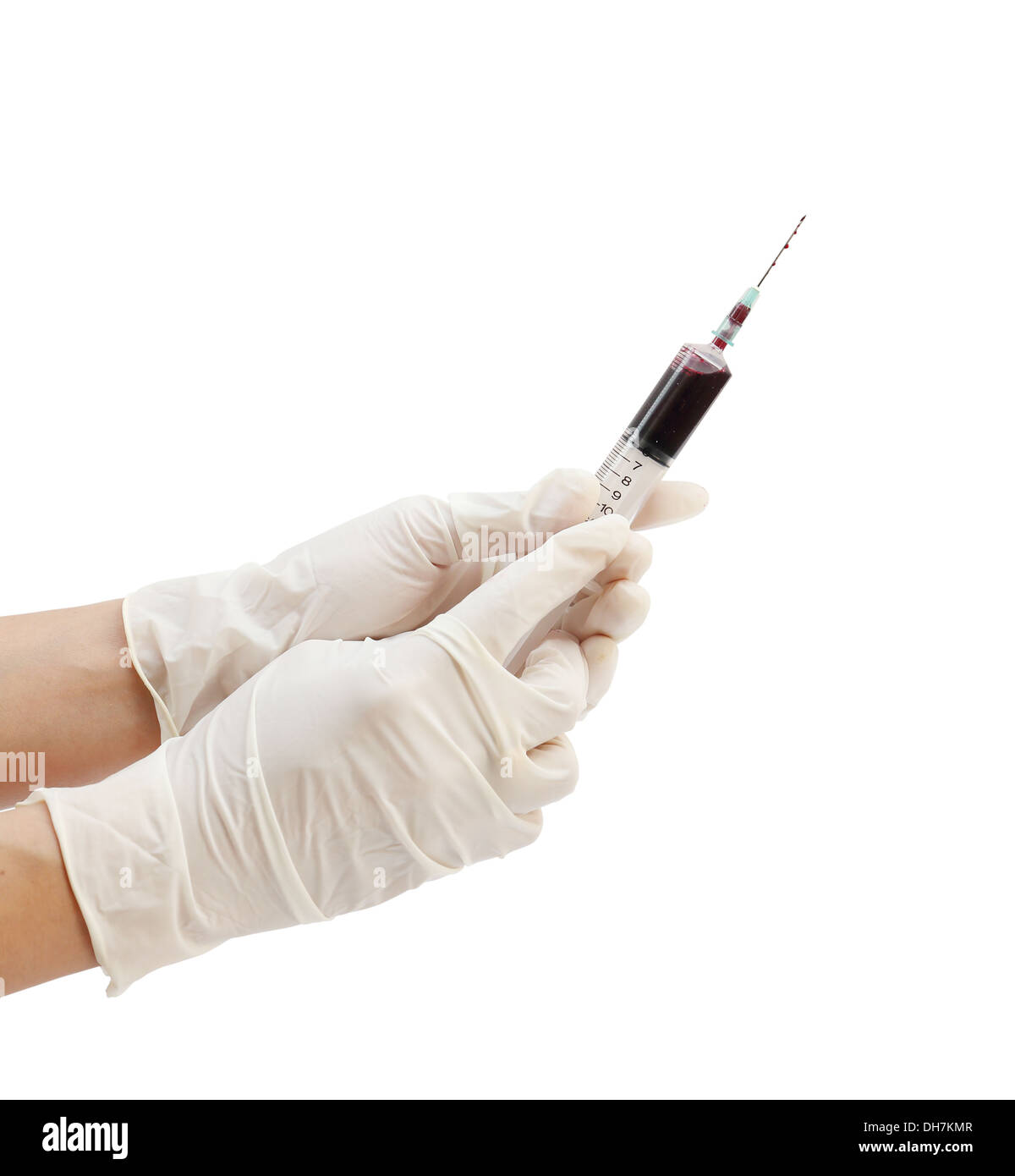 syringe with blood in hand on white background (with clipping path ...
