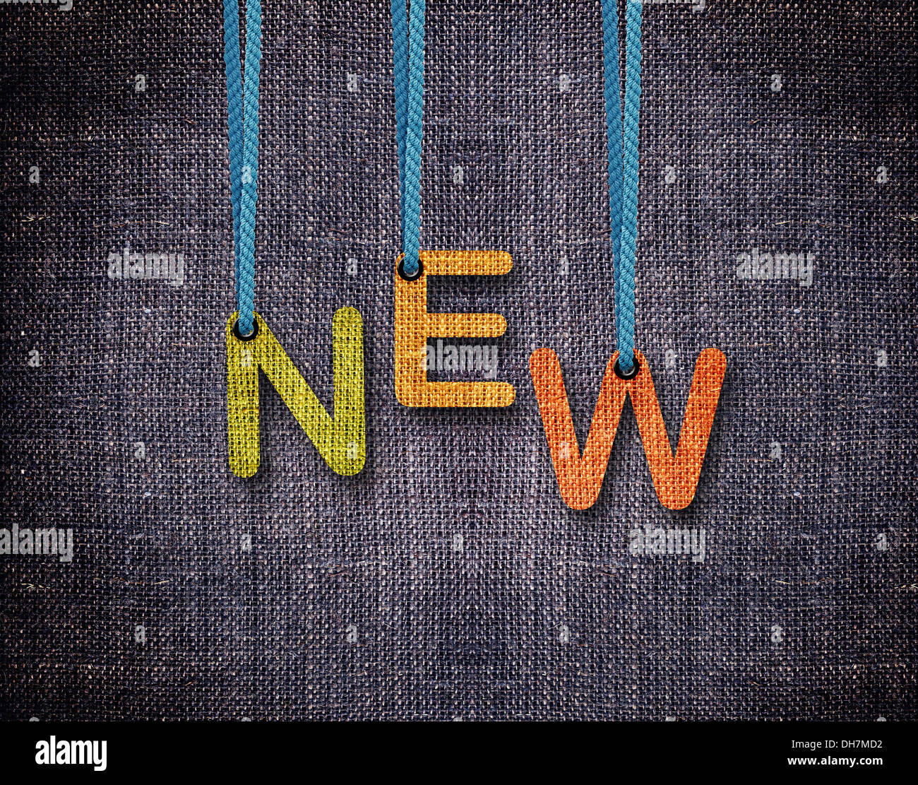 New letters hanging strings with blue sackcloth background Stock Photo ...