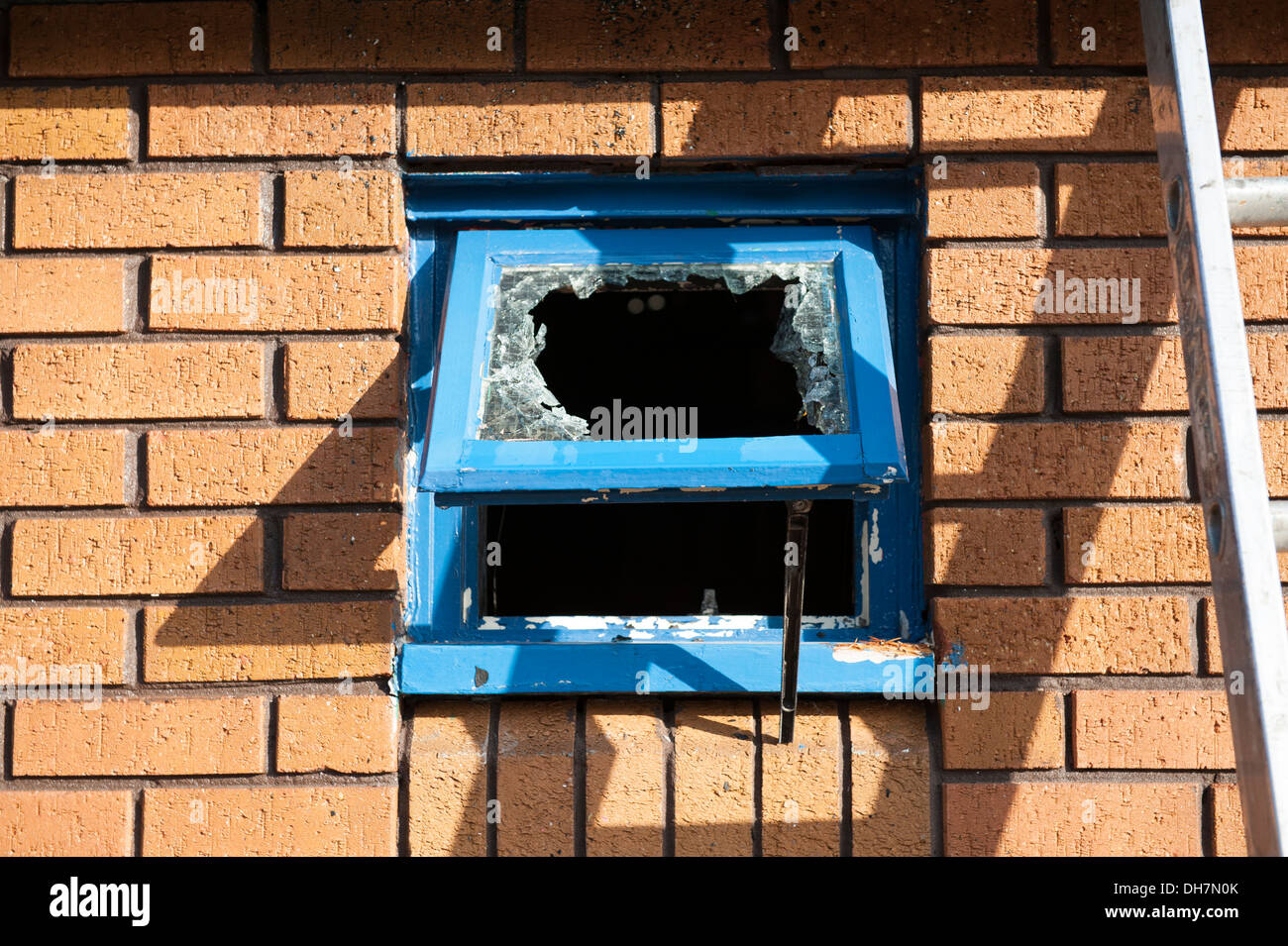 Smashed skylight small window glass theft crime Stock Photo - Alamy