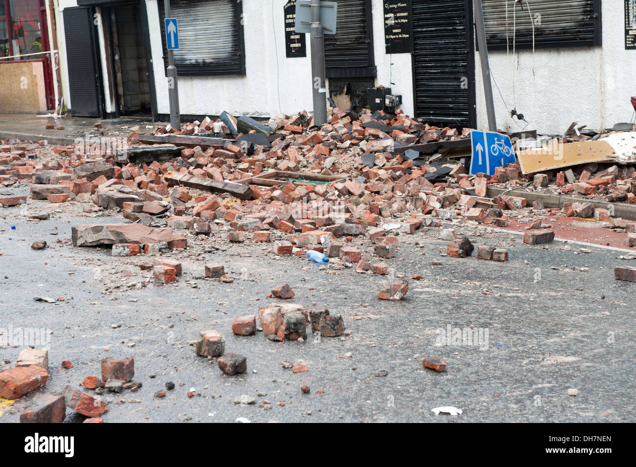 Bricks in road collapsed wall gas explosion Stock Photo - Alamy