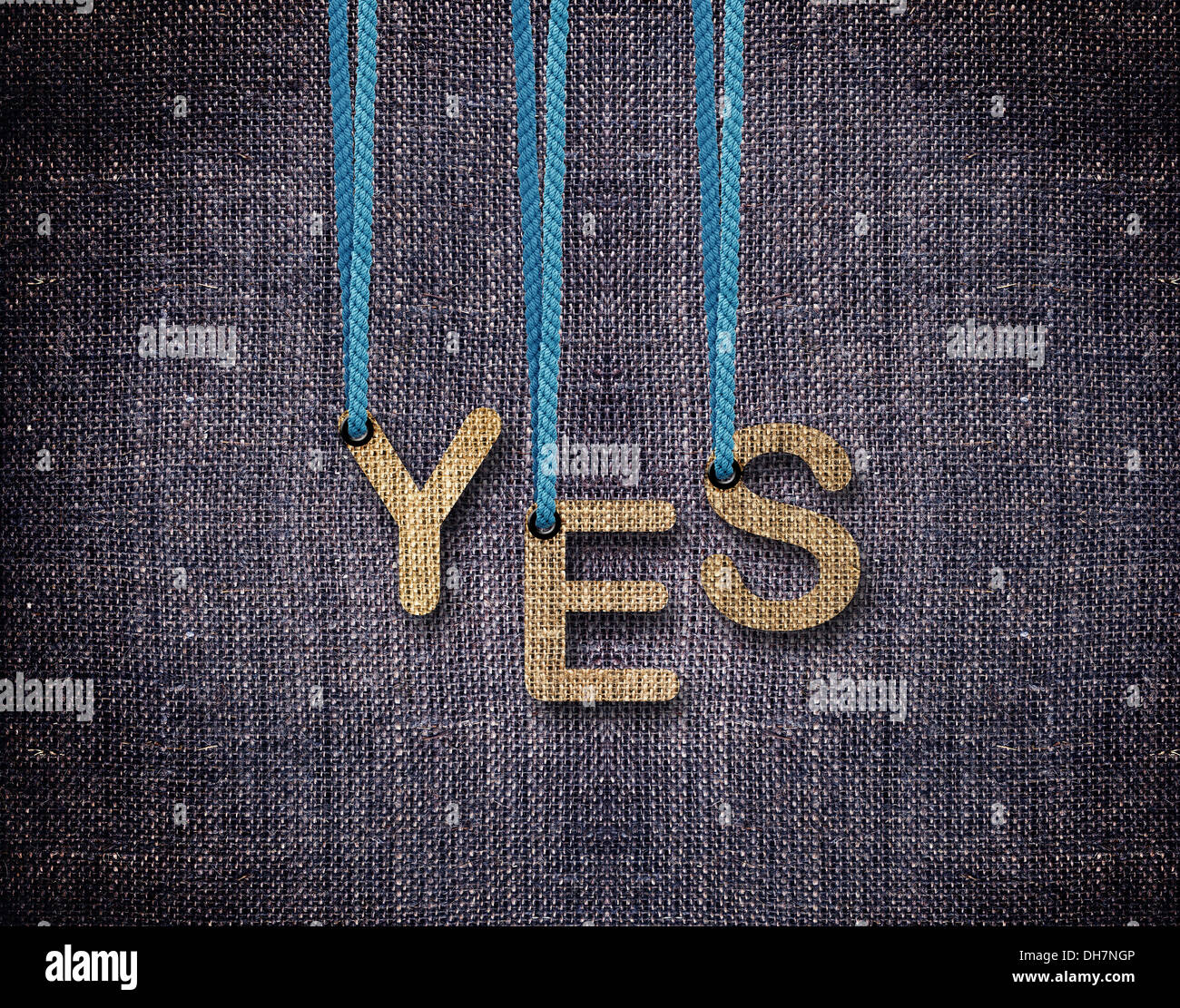 Yes Letters hanging strings with blue sackcloth background Stock Photo ...
