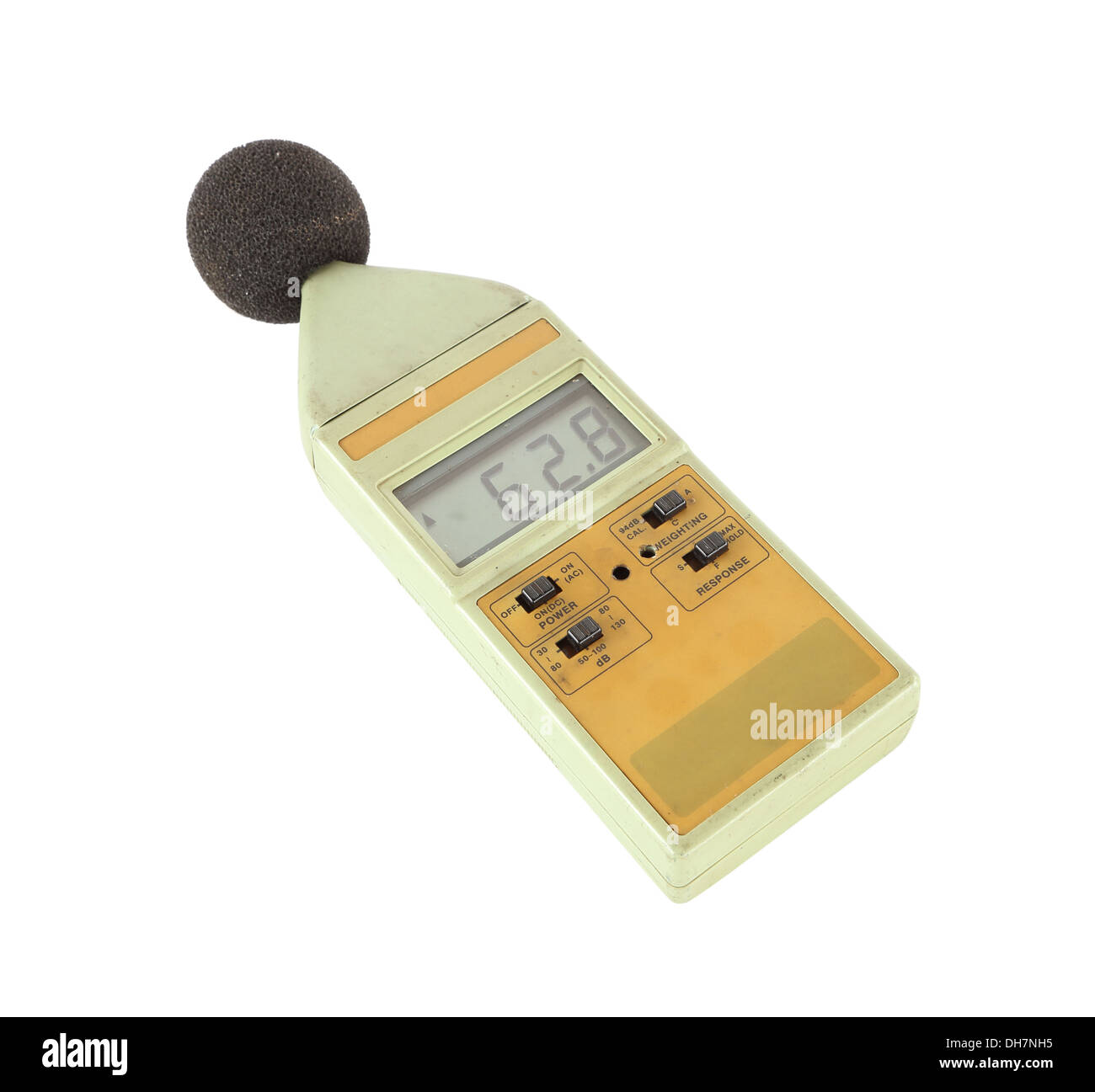 old sound level meter on white background Stock Photo - Alamy