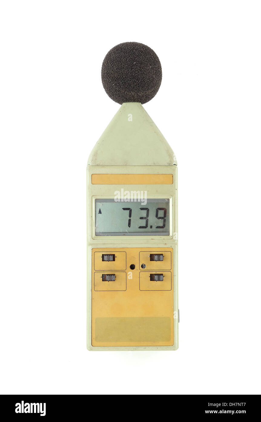 old sound level meter on white background Stock Photo - Alamy