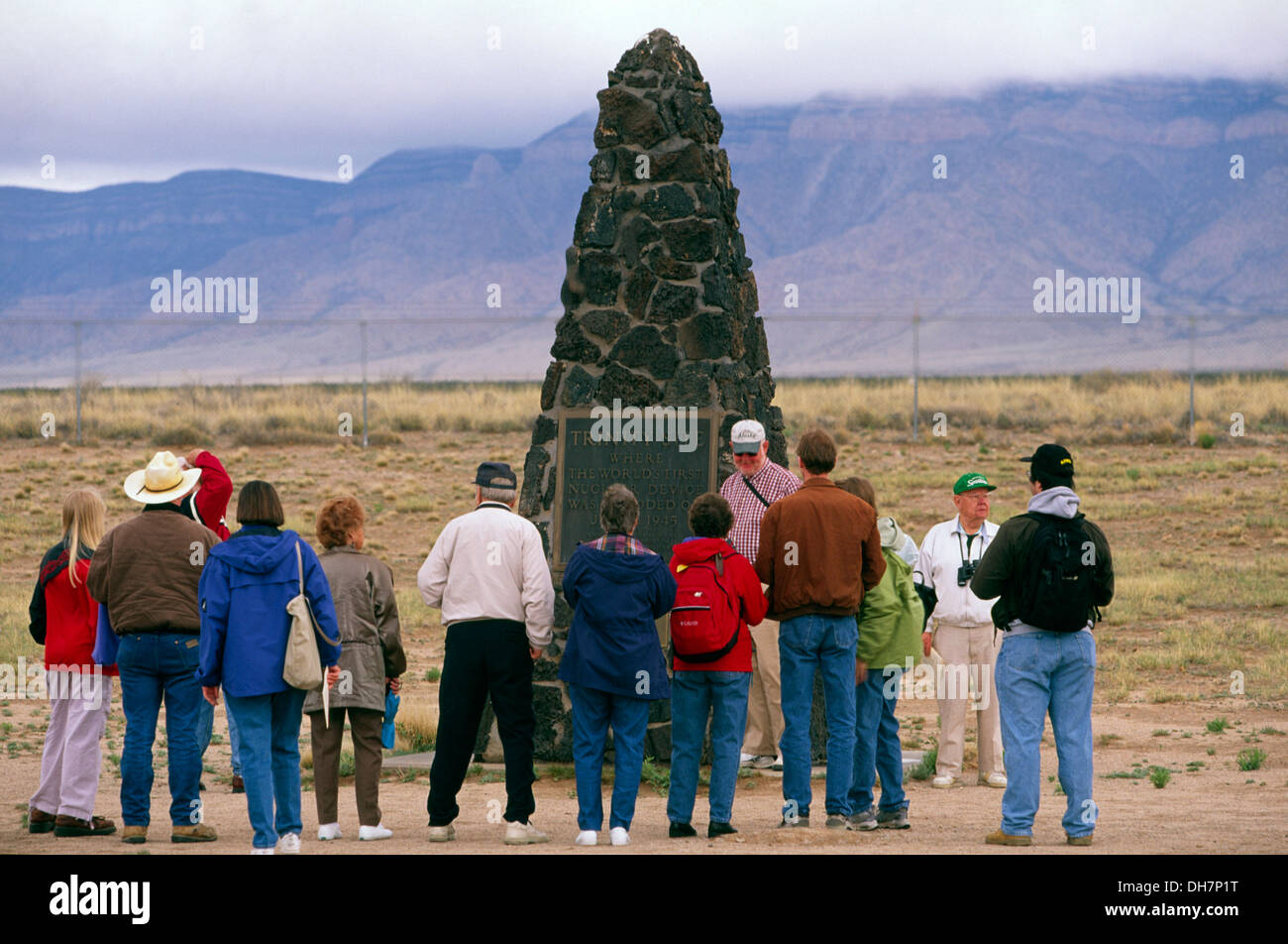 Visitors around stone marker at Trinity Site where first nuclear ...