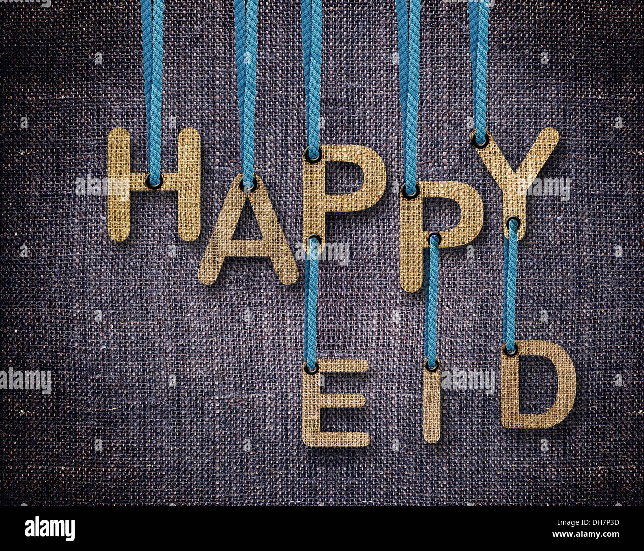 Happy Eid letters hanging strings with blue sackcloth background Stock ...