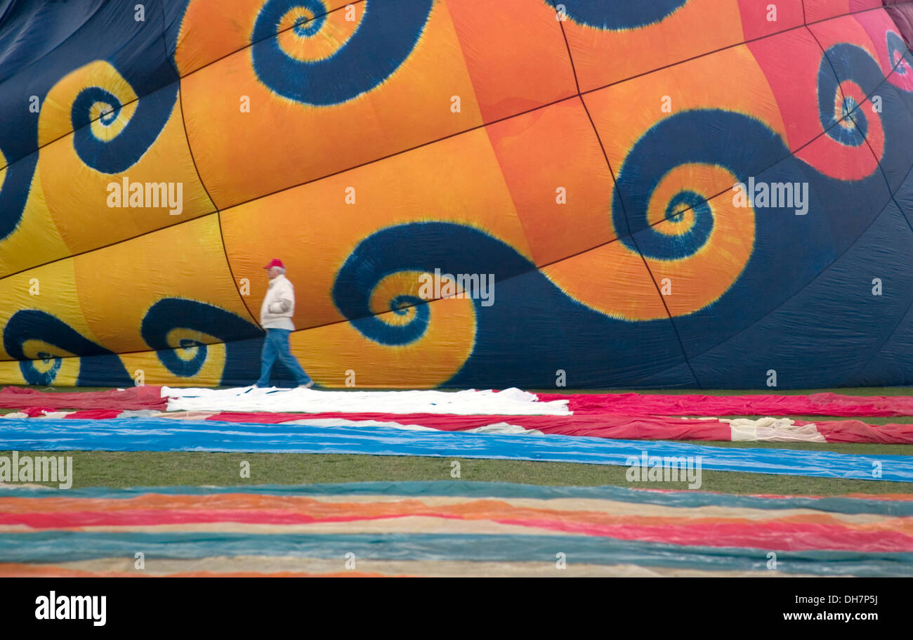 Man walking in front of hot air balloon on ground, Albuquerque ...