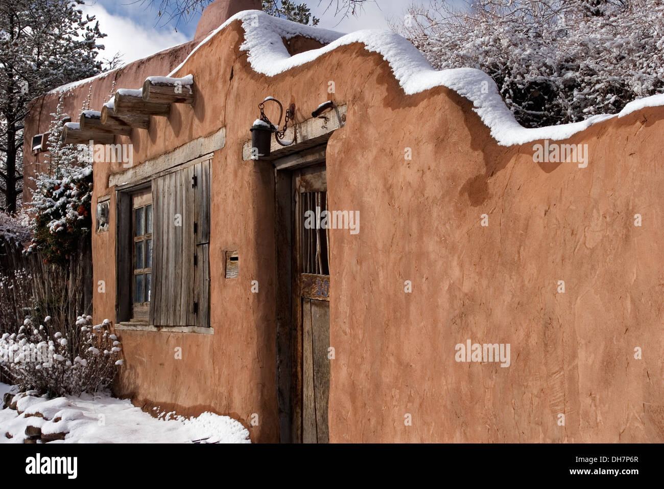 Adobe house covered in snow, Canyon Road, Santa Fe, New Mexico USA ...