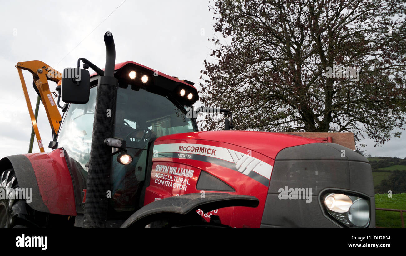Red McCormick tractor with a hedge cutter in Carmarthenshire Wales UK ...