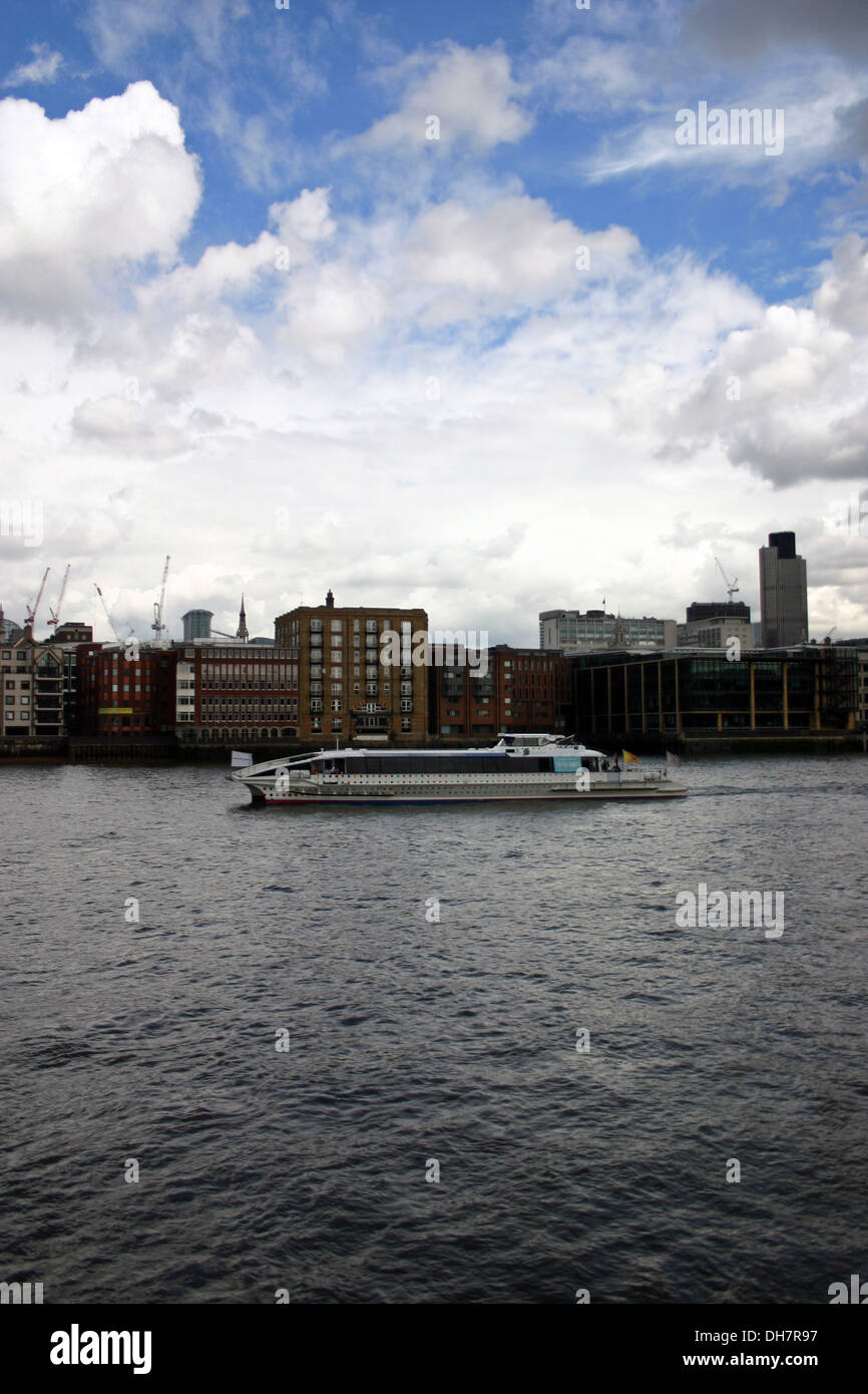 Thames clipper in the river Thames. Thames Clippers (styled as MBNA ...