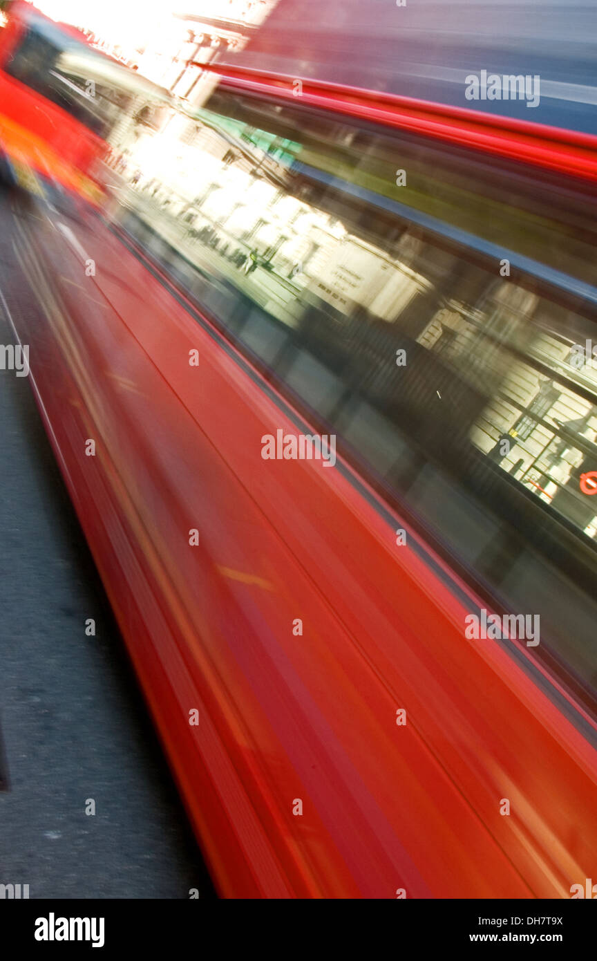 Abstract image of moving buses on a London street Stock Photo - Alamy