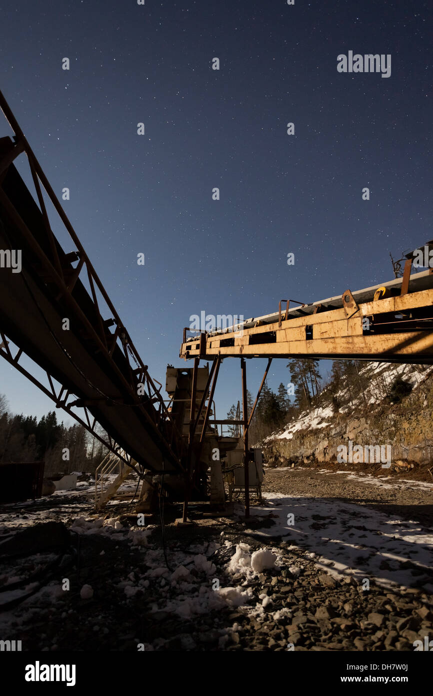 Old quarry machinery at night Stock Photo - Alamy