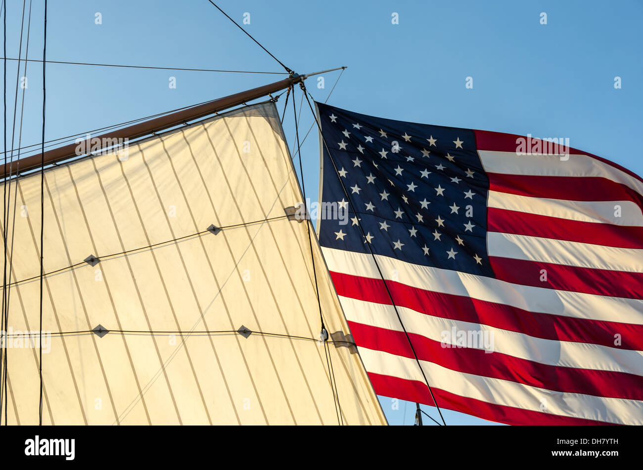 American Flag next to a sail and rigging Stock Photo - Alamy