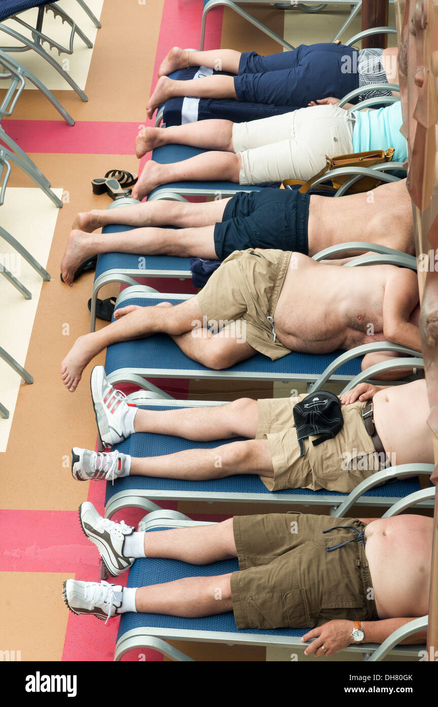 A group of overweight people on a cruise Stock Photo - Alamy