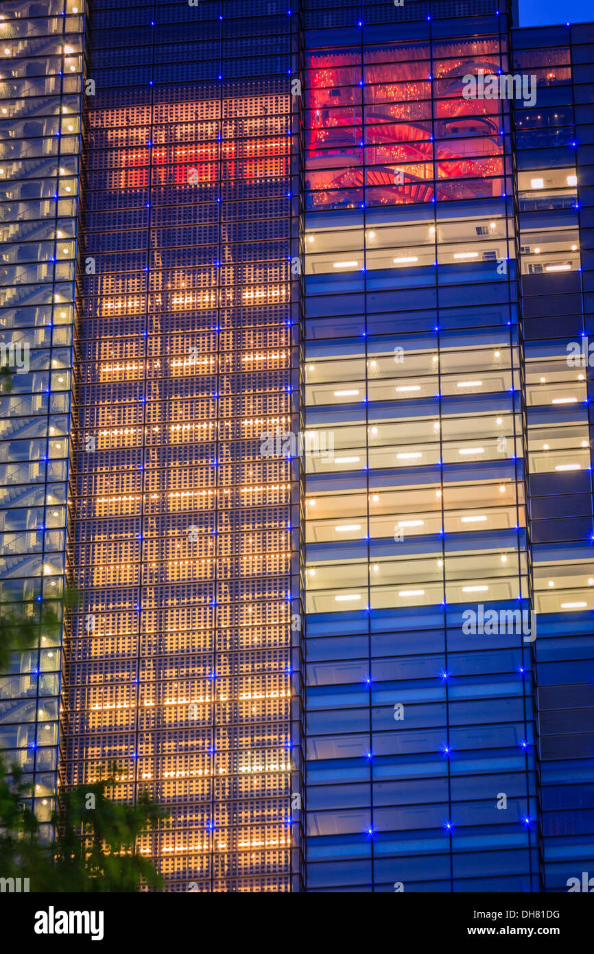 Offices building lit at night Stock Photo - Alamy