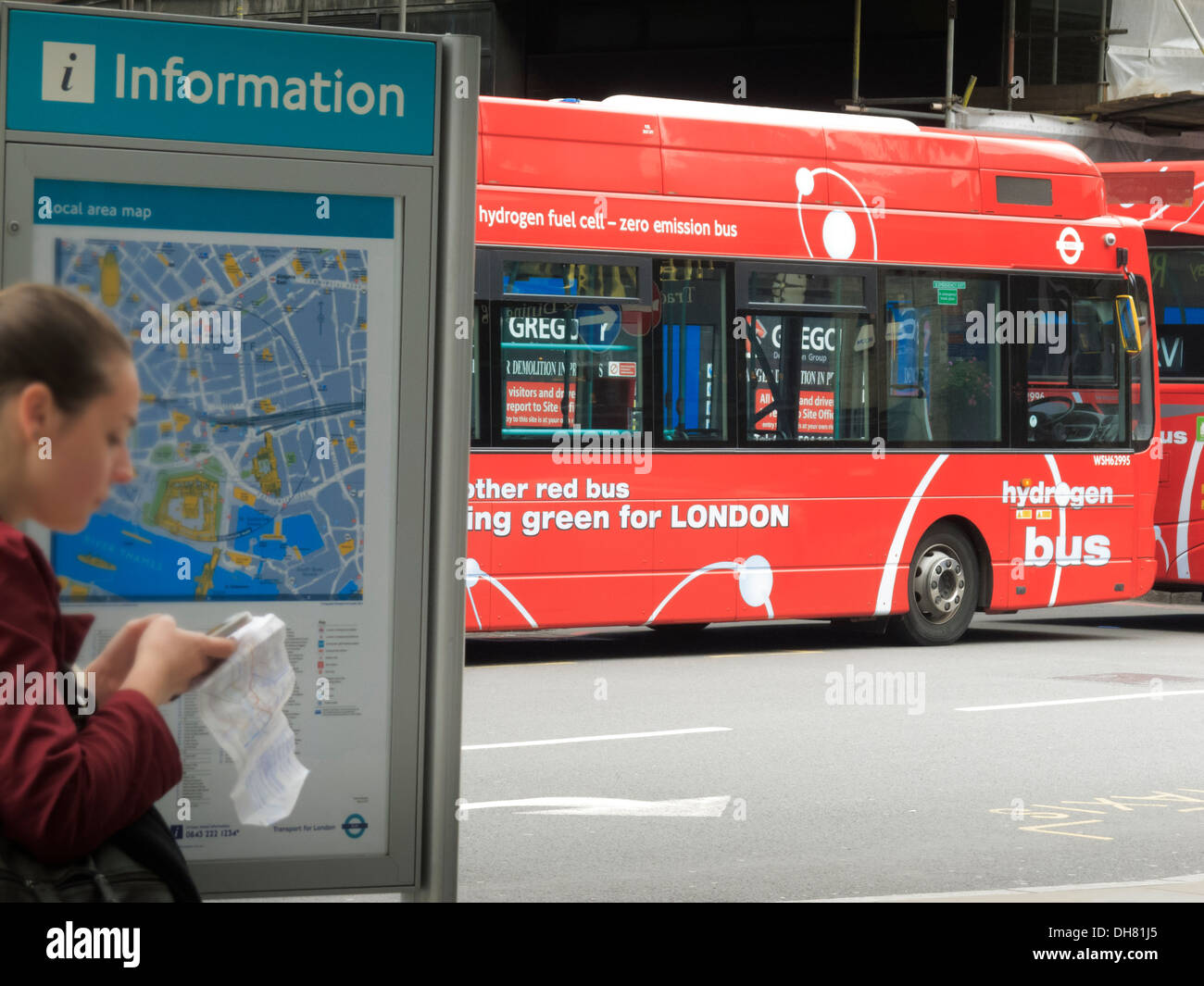 Up todate Hydrogen bus and time table London England Stock Photo - Alamy