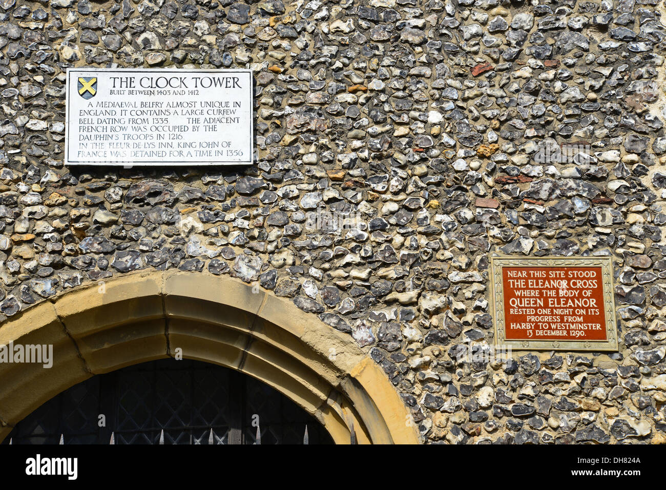 Queen Eleanor Cross plaque on clock tower, Market Place, St.Albans ...