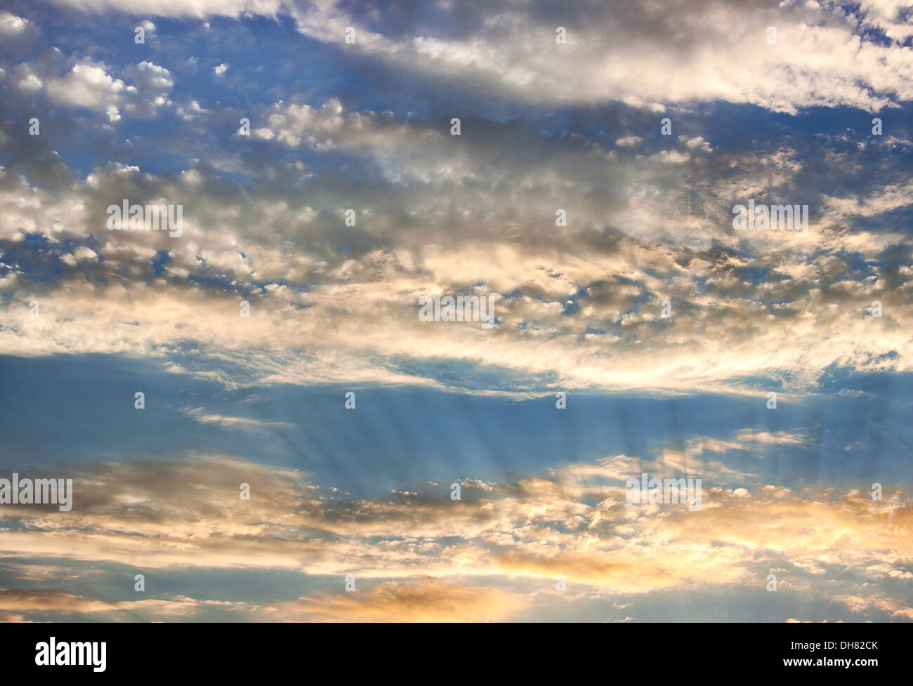 Storm clouds rolling past clear skies Stock Photo - Alamy