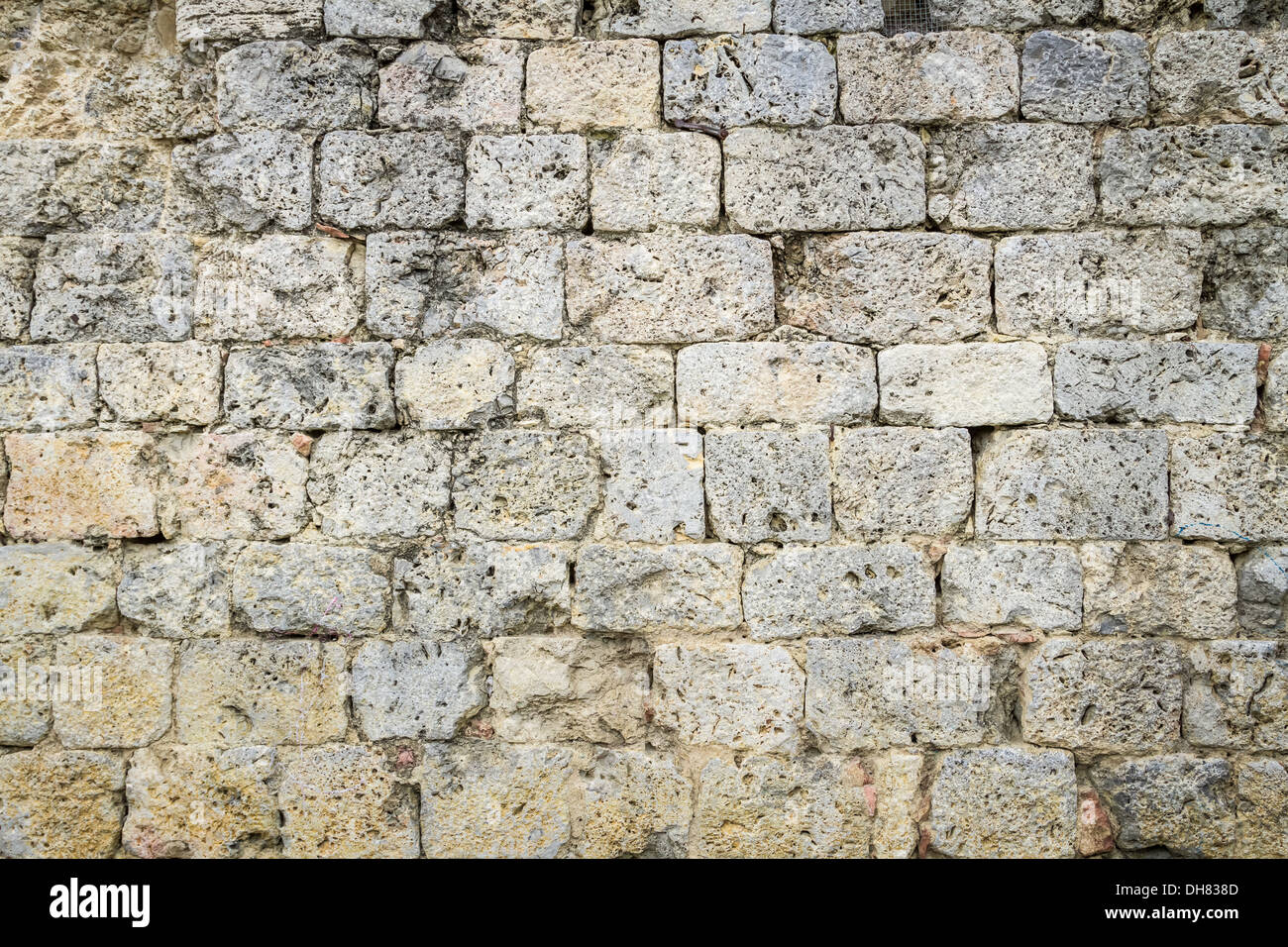 Medieval wall built of stone Stock Photo - Alamy