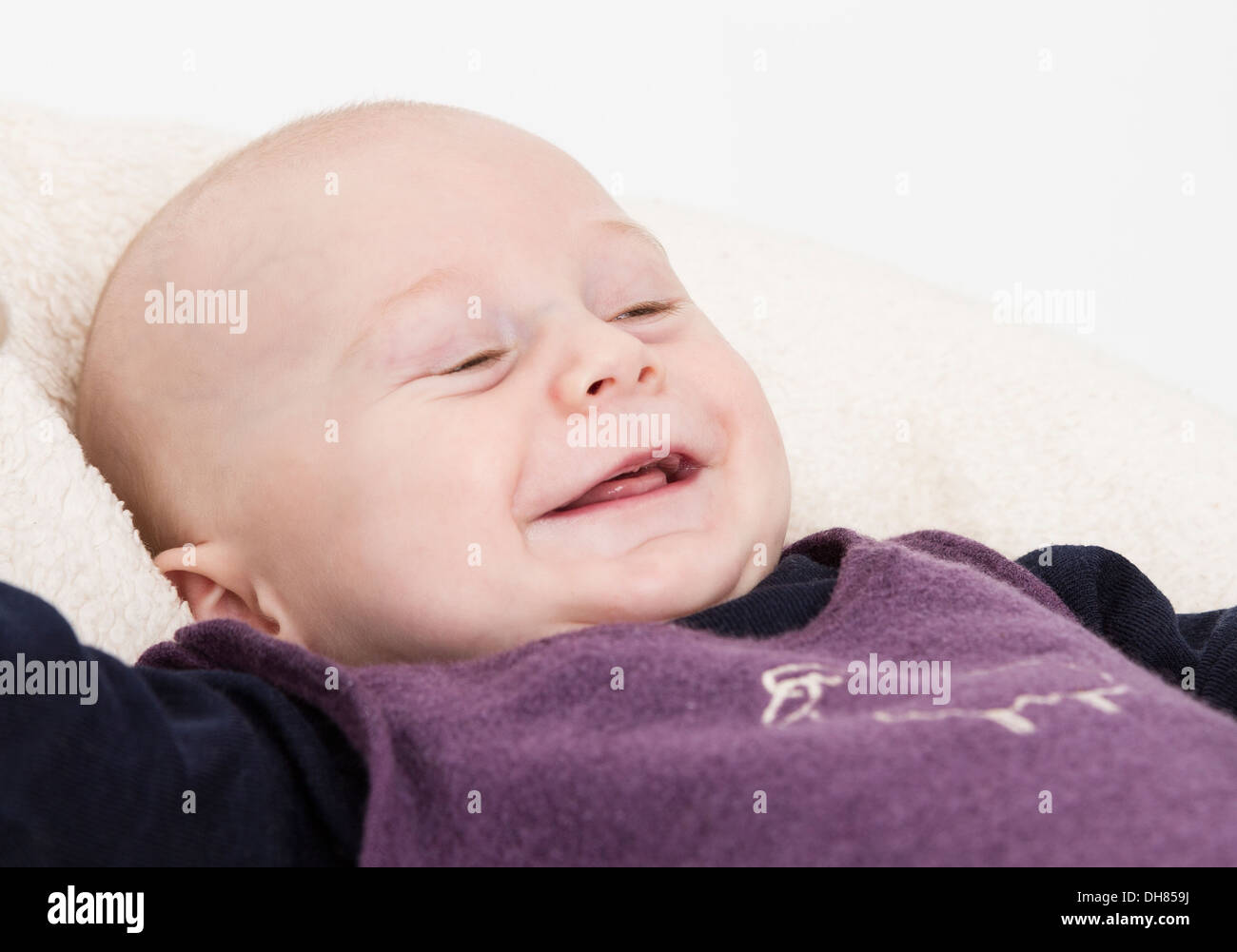 smiling young child in light background. horizontal image Stock Photo ...